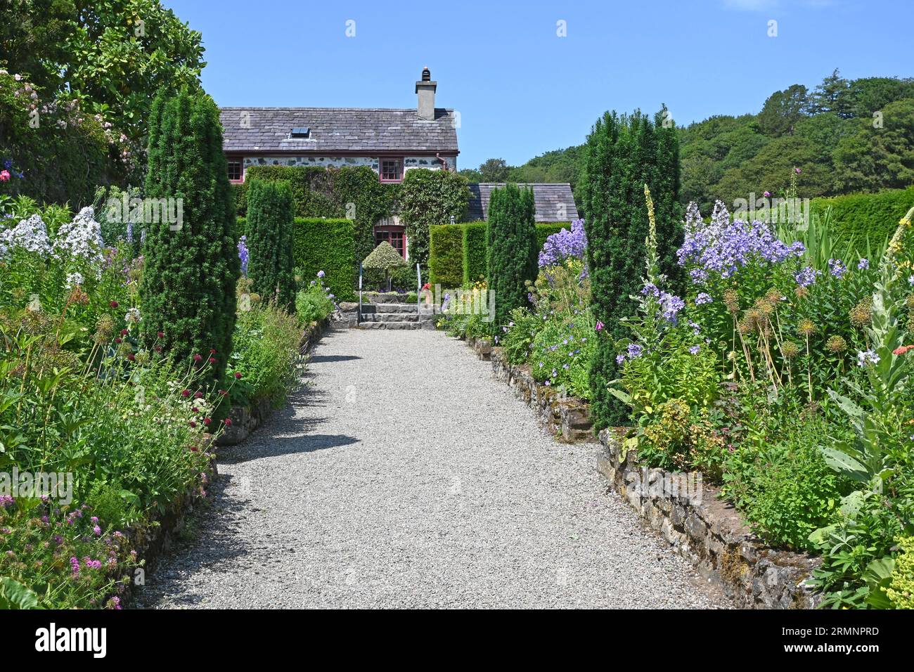 The double herbaceous border at Plas Cadnant, the Hidden Gardens, Menai Bridge, Anglesey Stock ...