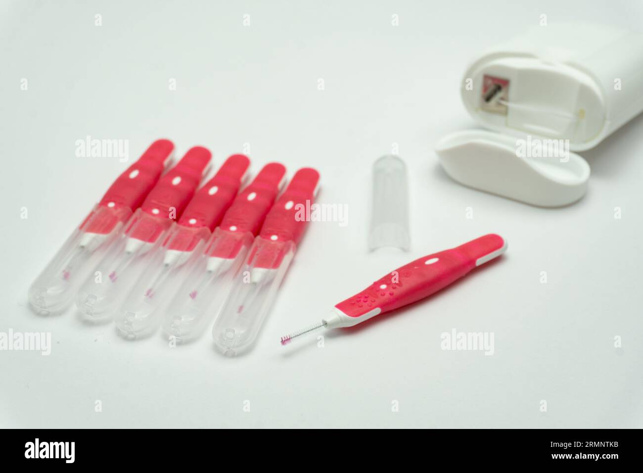 Interdental brush sticks and dental floss on white background, copy ...