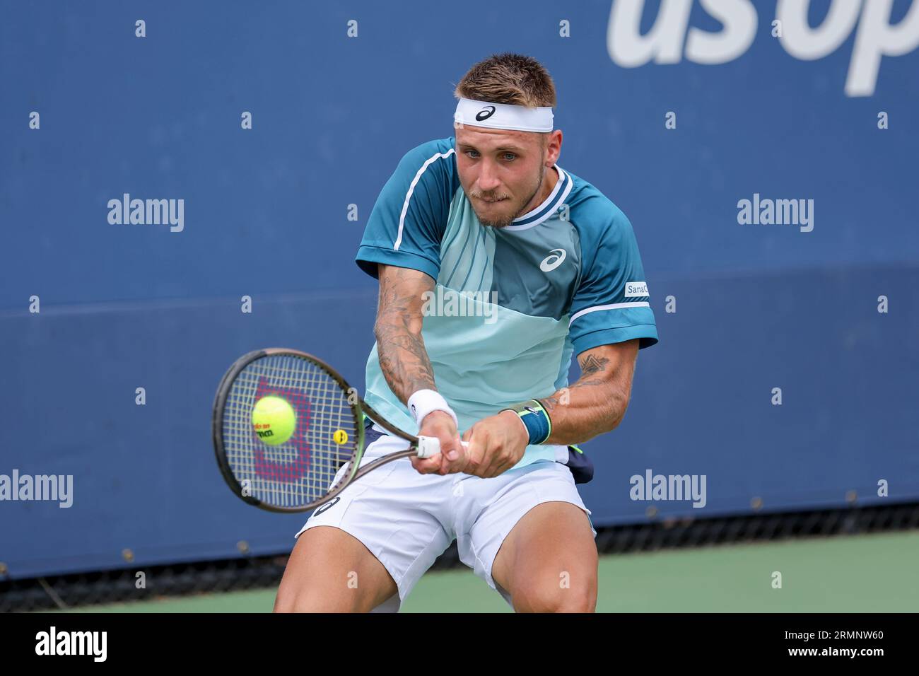 Alex Molcan in action during a men's singles match at the 2023 US Open ...