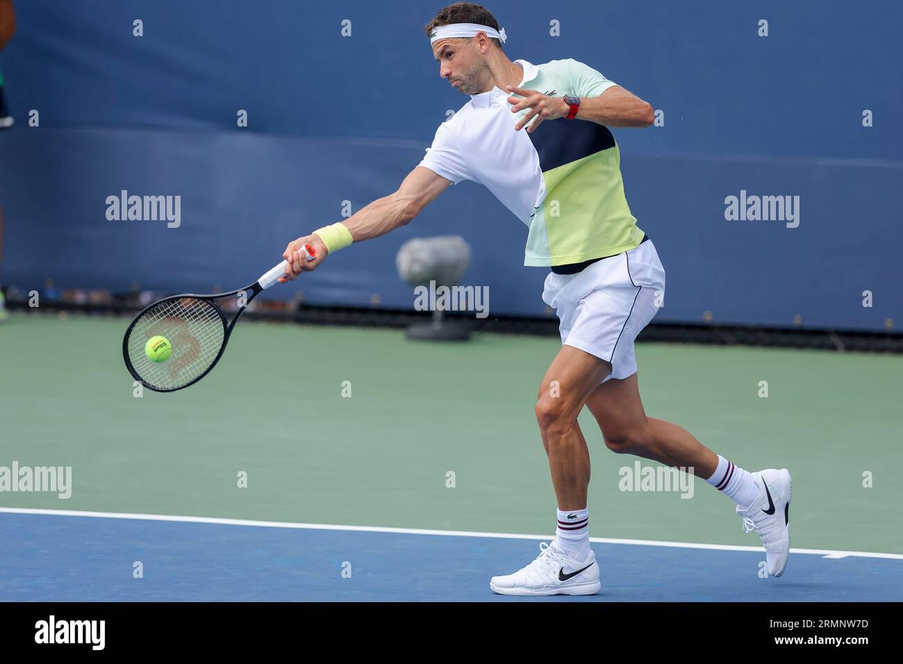 Grigor Dimitrov in action during a men's singles match at the 2023 US Open, Tuesday, Aug. 29 ...