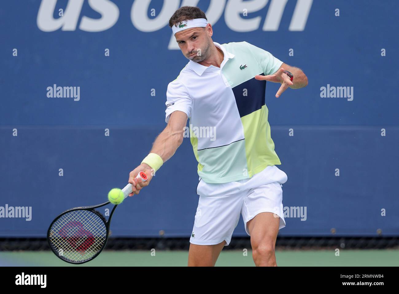 Grigor Dimitrov in action during a men's singles match at the 2023 US Open, Tuesday, Aug. 29 ...