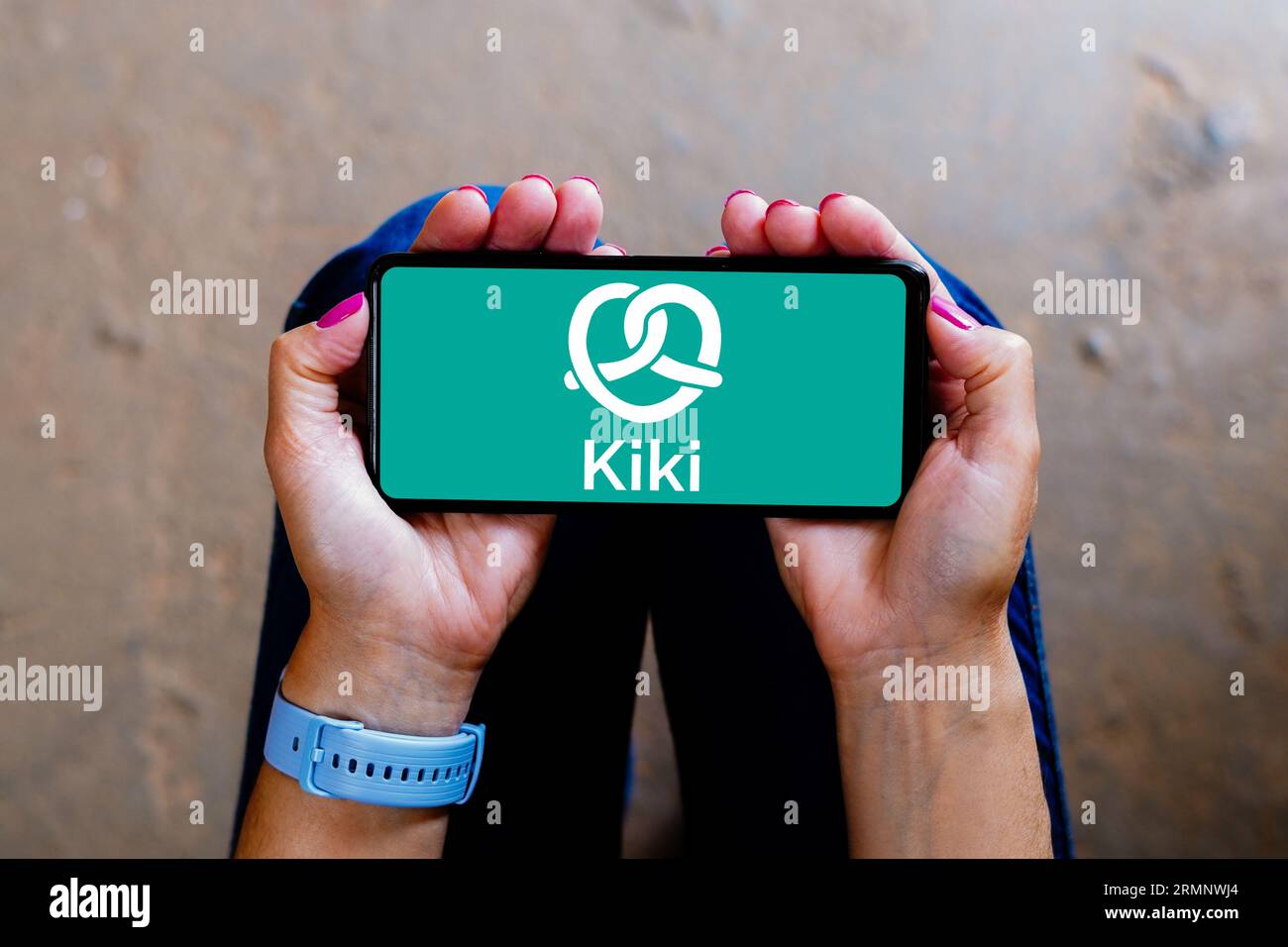 In this photo illustration, the KiKi logo seen displayed on a ...