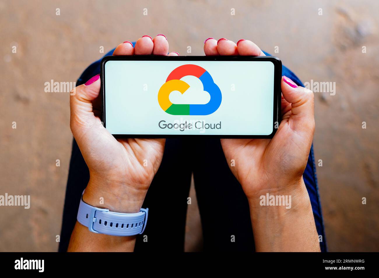 In this photo illustration, the Google Cloud logo seen displayed on a ...