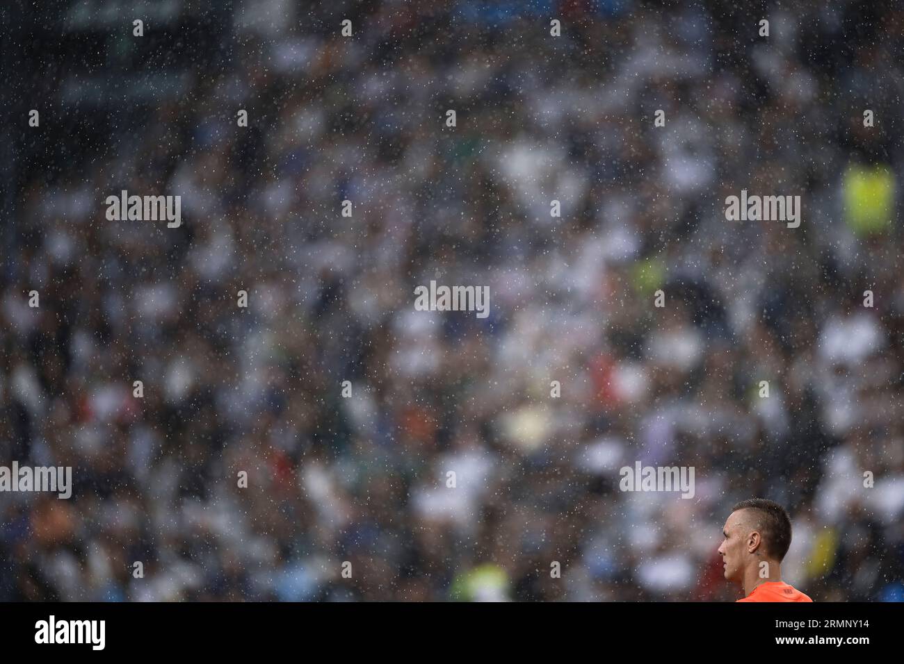 Lukasz Skorupski of Bologna FC looks on under heavy rainfall during the ...