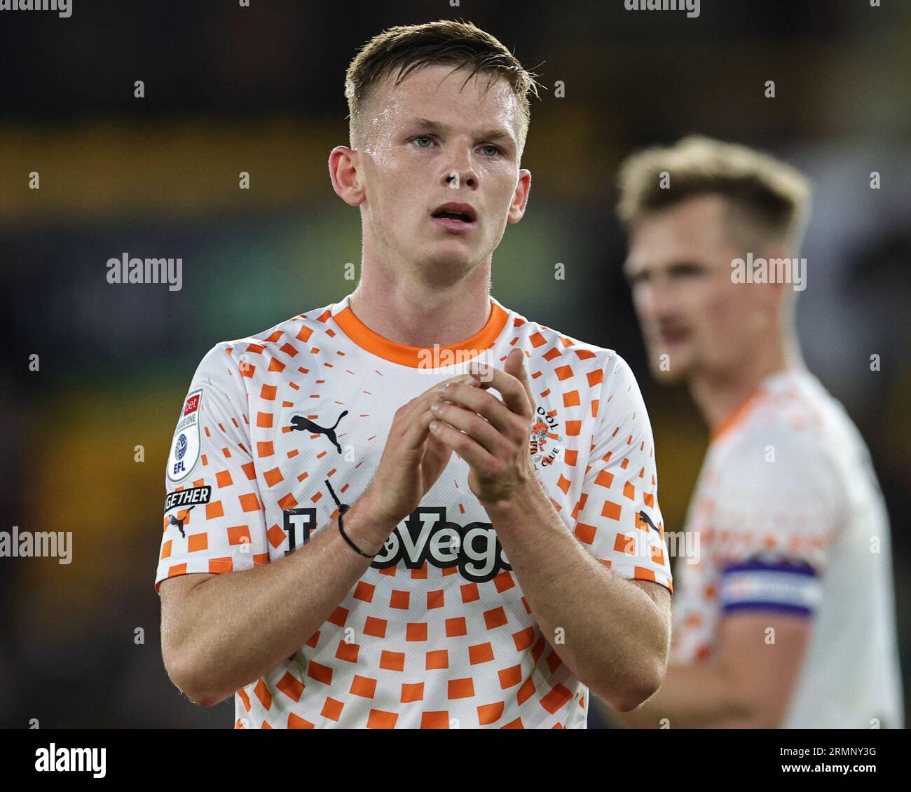 Andy Lyons #24 of Blackpool applauds the travelling fans during the Carabao Cup match ...