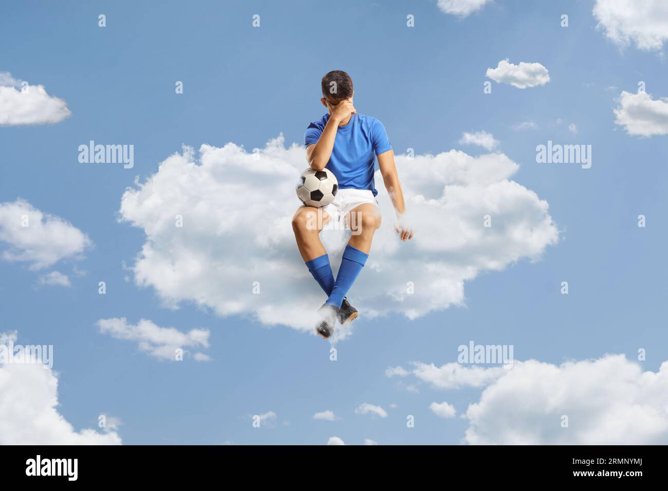 Sad soccer player sitting hi-res stock photography and images - Alamy