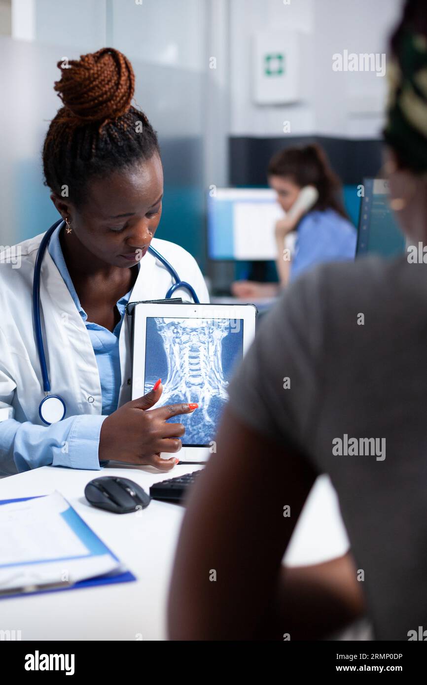 Radiology specialist doctor with lung x-ray ct scan giving medical ...