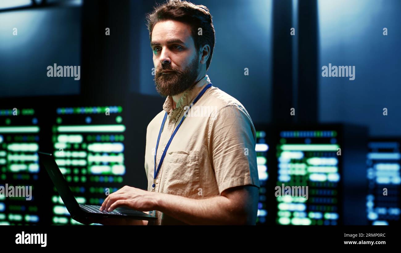 Expert inspecting high tech facility responsible with intense data ... Expert inspecting high tech facility responsible with intense data ...