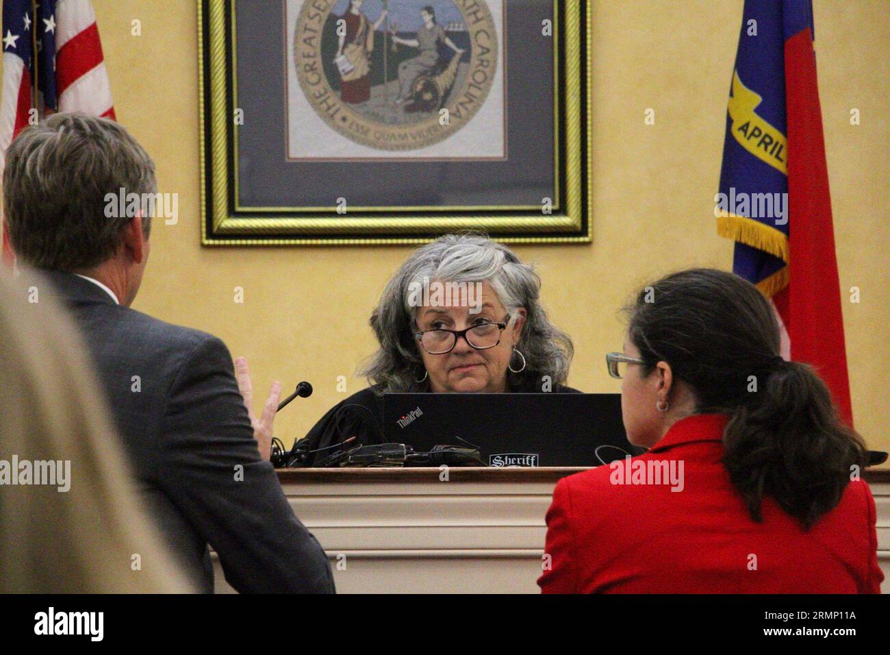 Superior Court Judge Sherri Murrell, center, speaks with Orange County ...