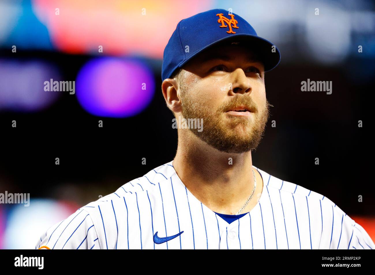 New York Mets starting pitcher Tylor Megill (38) walks to the dugout ...
