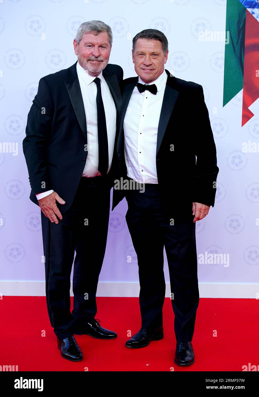 Tony Cottee (right) arrives for the 2023 PFA Awards at The Lowry ...