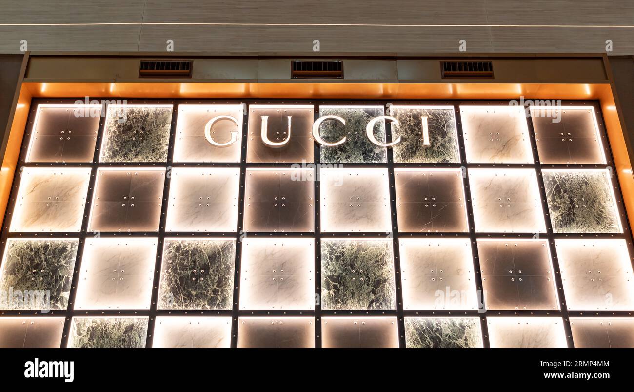 A picture of a Gucci sign on a store Stock Photo - Alamy