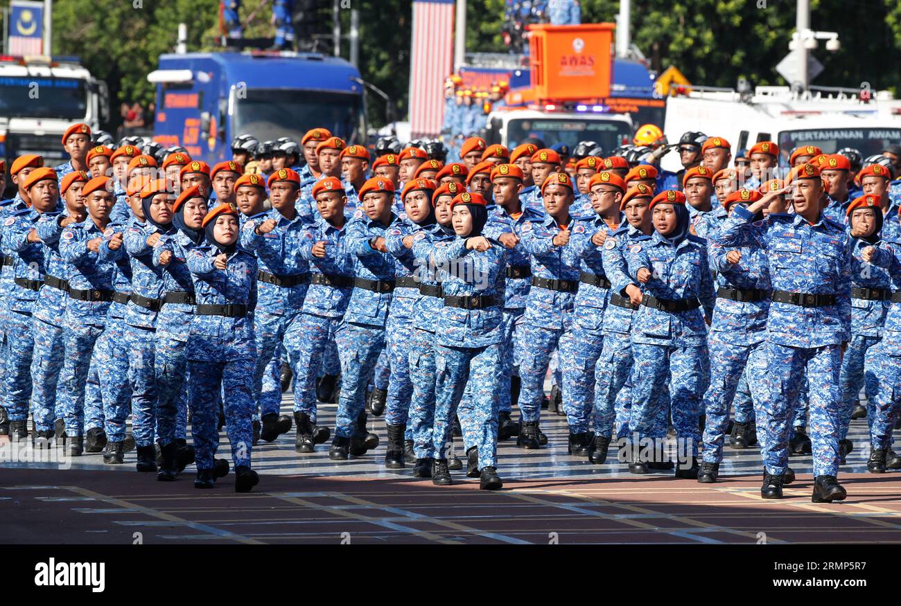 Malaysia civil defence personnel hi-res stock photography and images ...