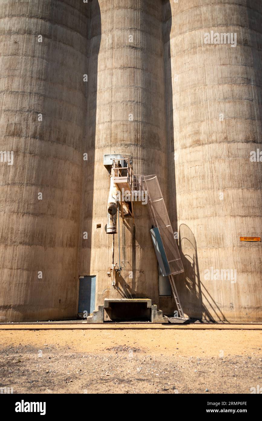 Australian grain silo with a train track in the foreground, unloader ...