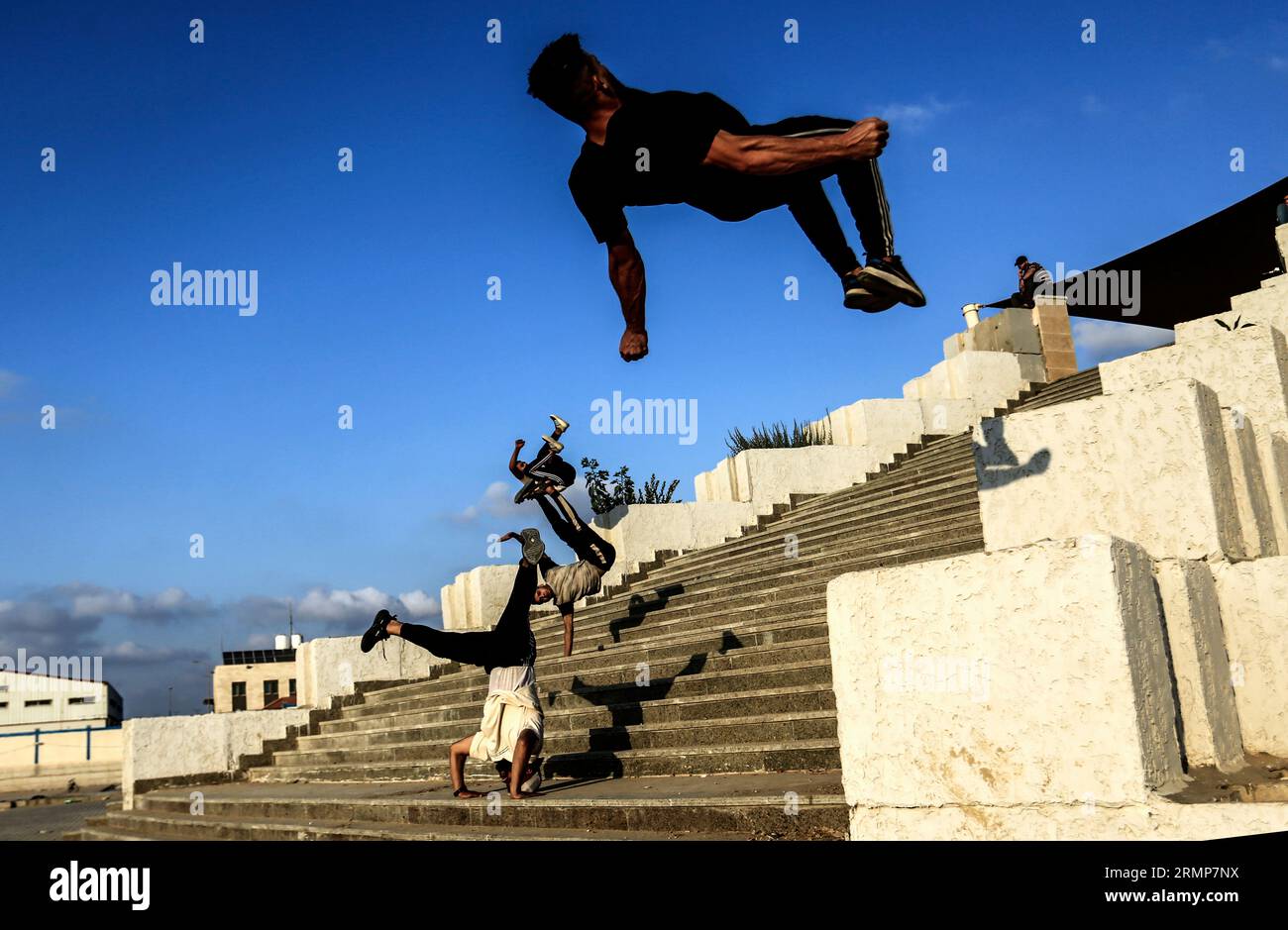 Palestinian youths from the freestyle parkour team in Gaza practice ...