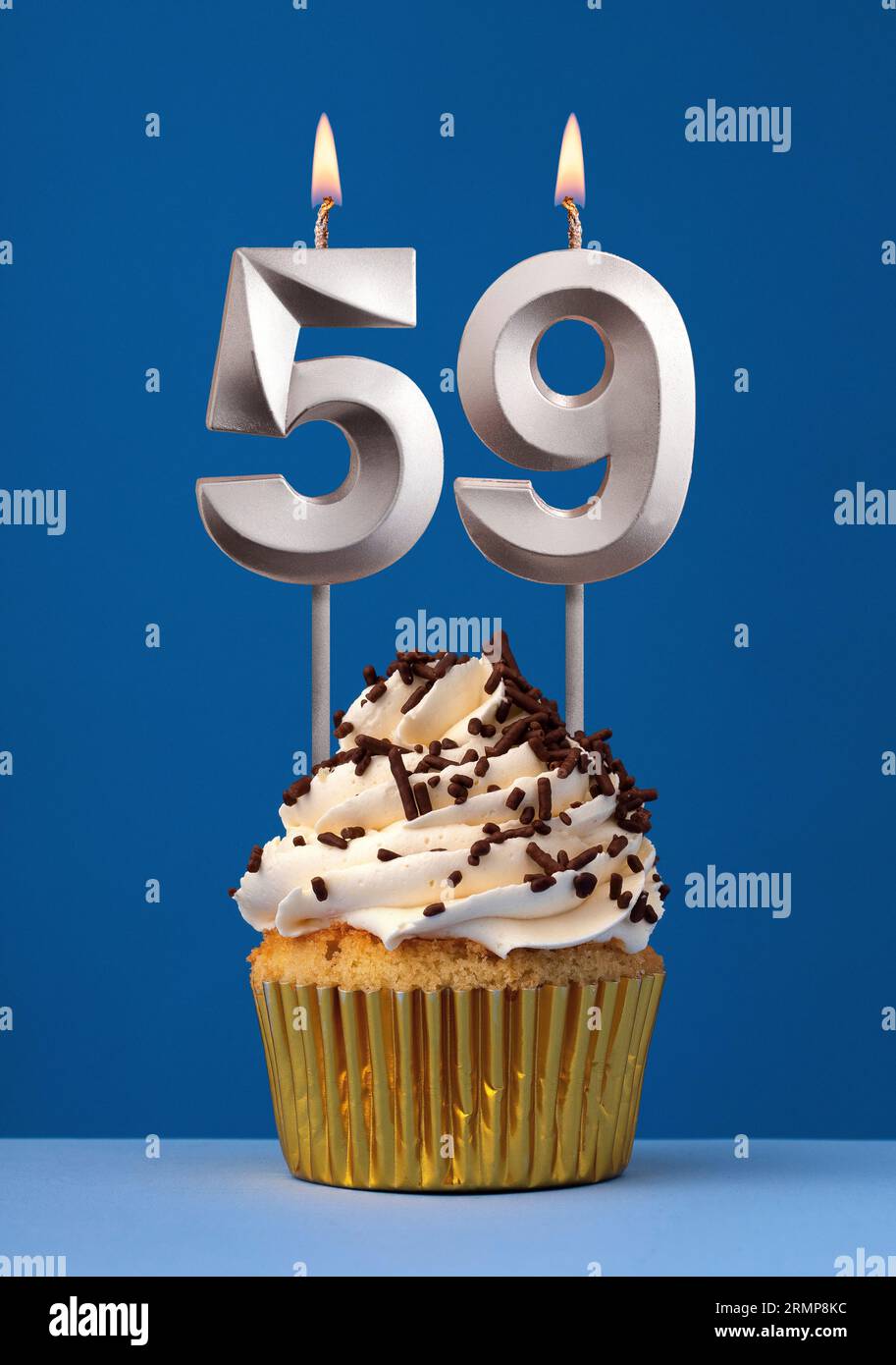 Burning candle number 59 - Birthday card with cake on blue Background ...