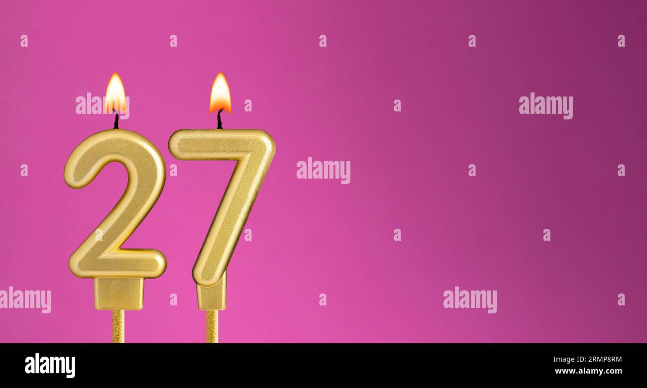 Candle number 27 in purple background - birthday card Stock Photo - Alamy