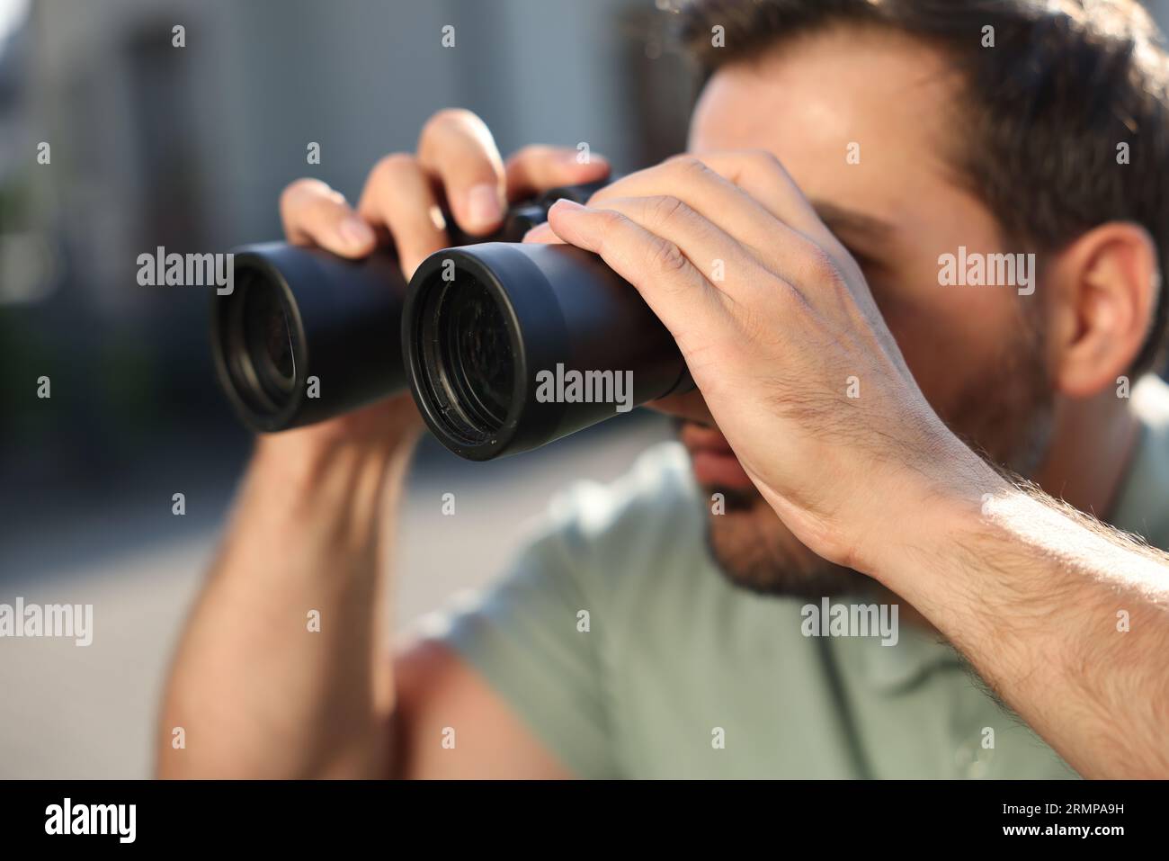 Spying on neighbours hi-res stock photography and images - Alamy