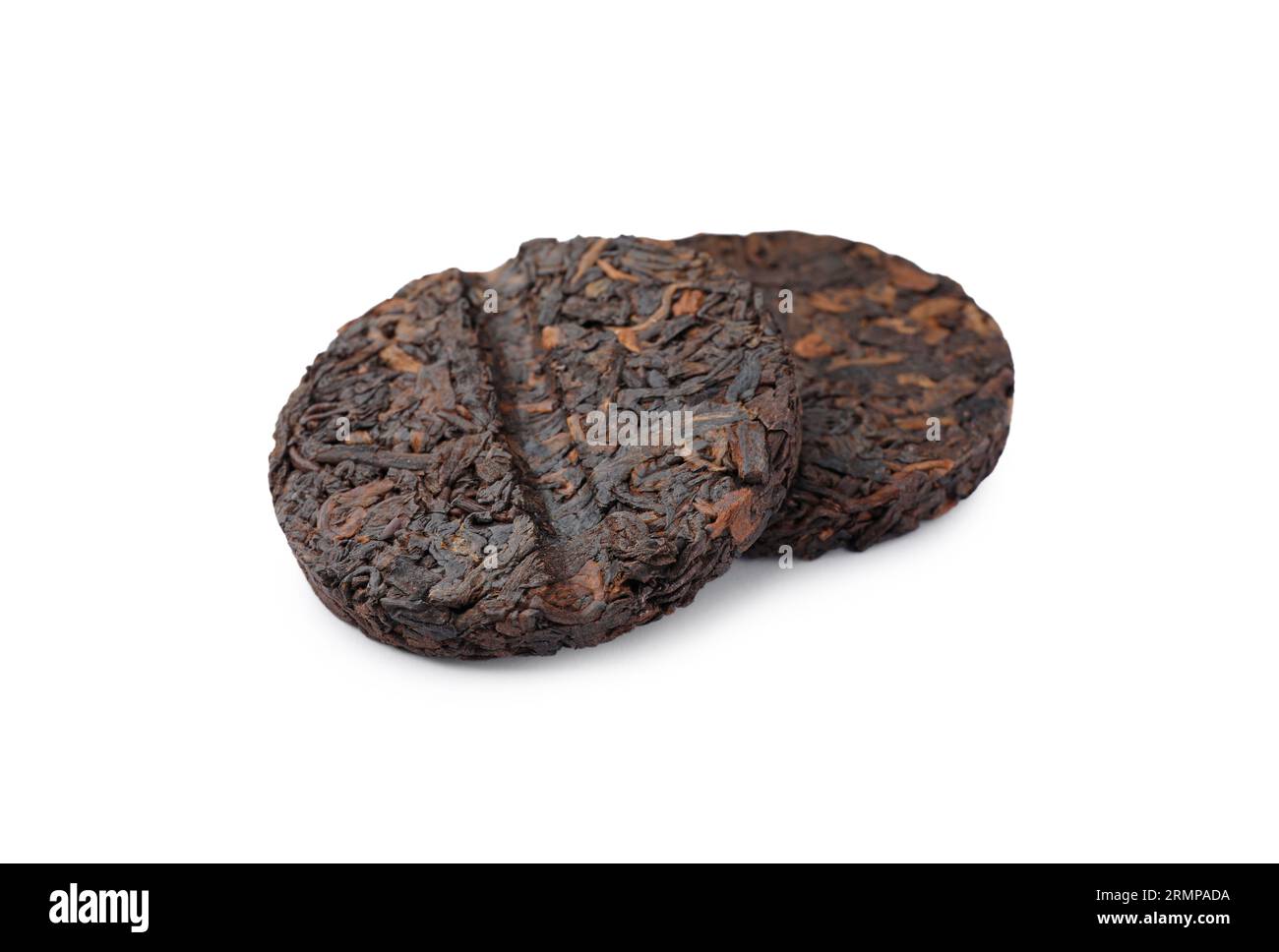 Disc shaped traditional Chinese pu-erh tea isolated on white Stock ...