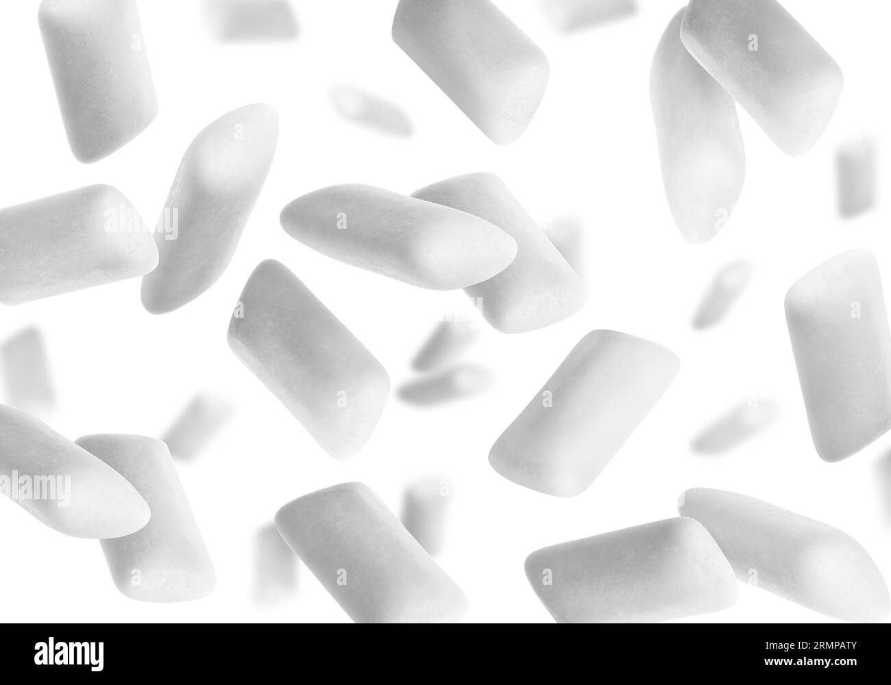 Many chewing gum pads falling on white background Stock Photo - Alamy