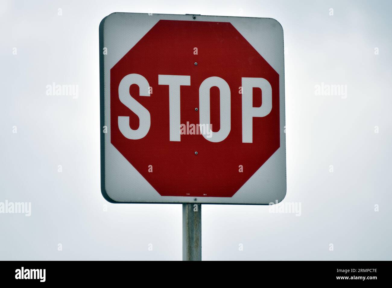 Stop sign - public road marking Stock Photo - Alamy