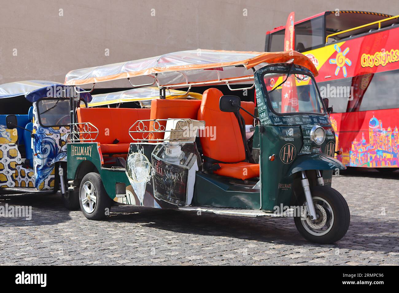 Highly decorated electric Tuck-tuck auto rickshaws parked waiting for ...