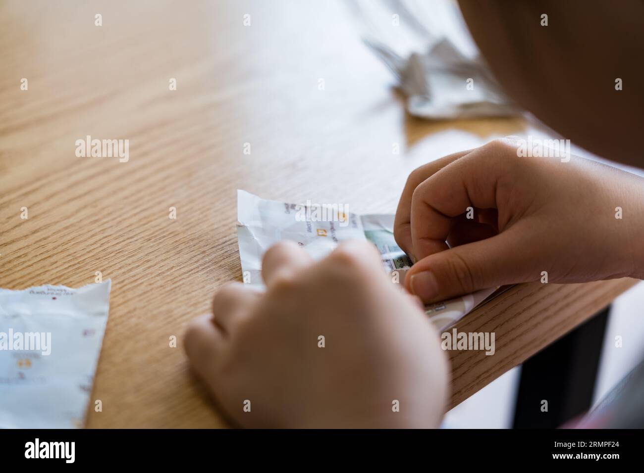 Folding paper with hand hi-res stock photography and images - Alamy