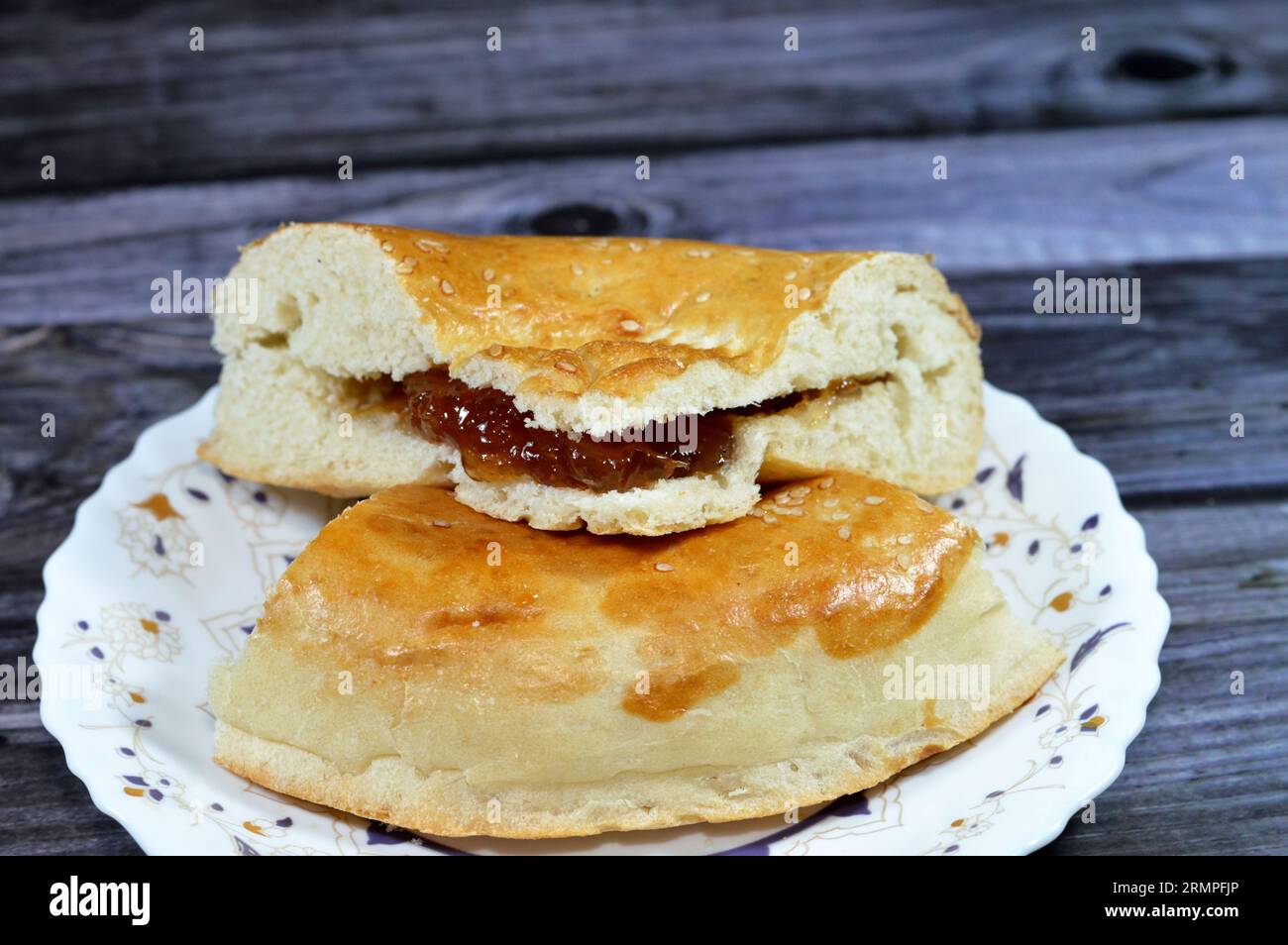 Fig fruit jam stuffed inside a tandyr nan Uzbek bread, a type of ...