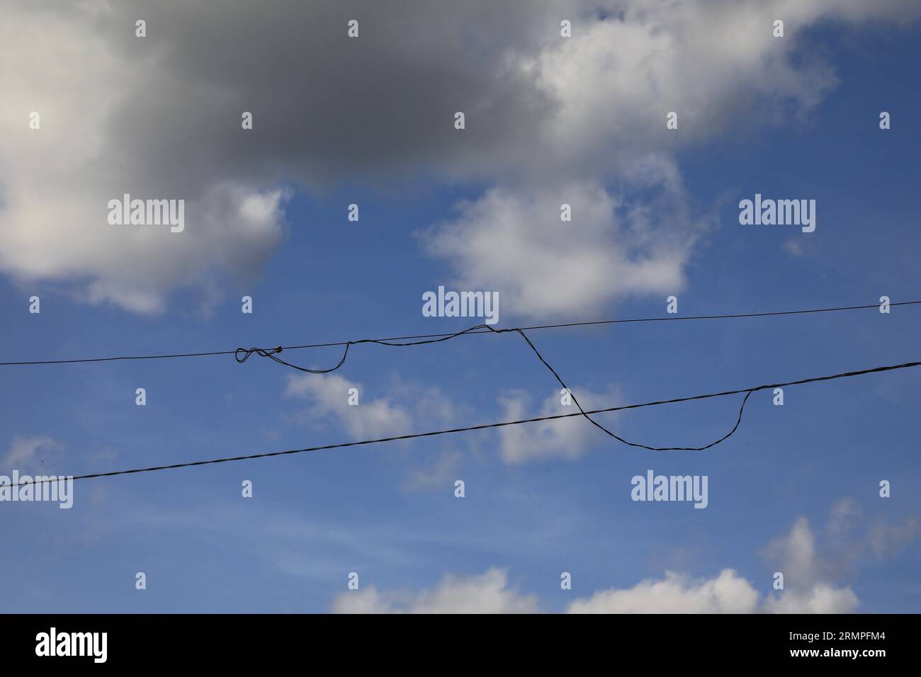 Damaged electrical wires from the storm Stock Photo - Alamy