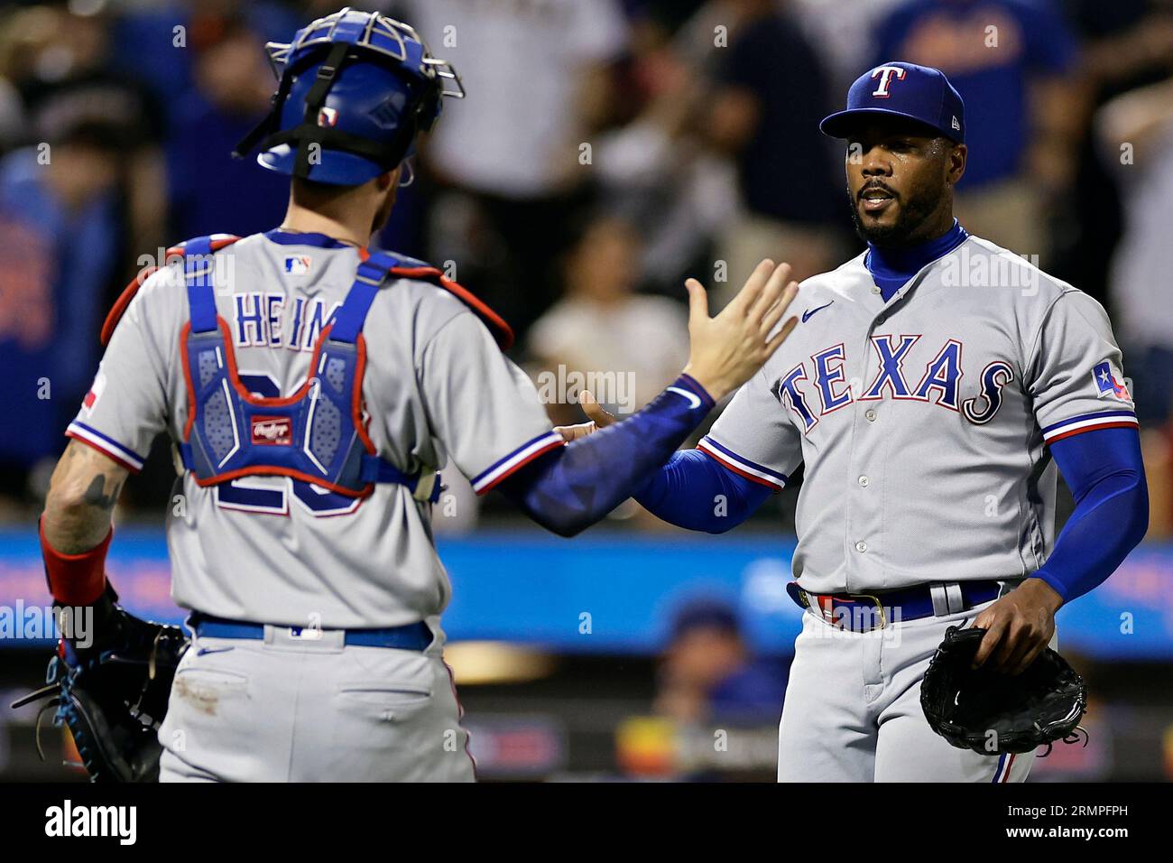 Texas Rangers pitcher Aroldis Chapman and Jonah Heim react after the ...