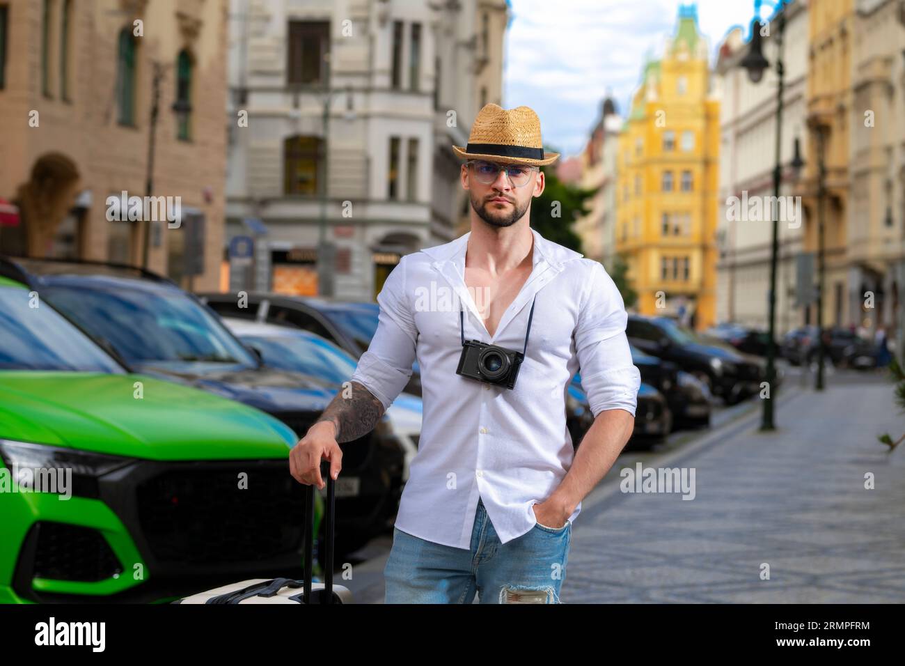 Travelling concept. Man with luggage being ready to travel on his ...