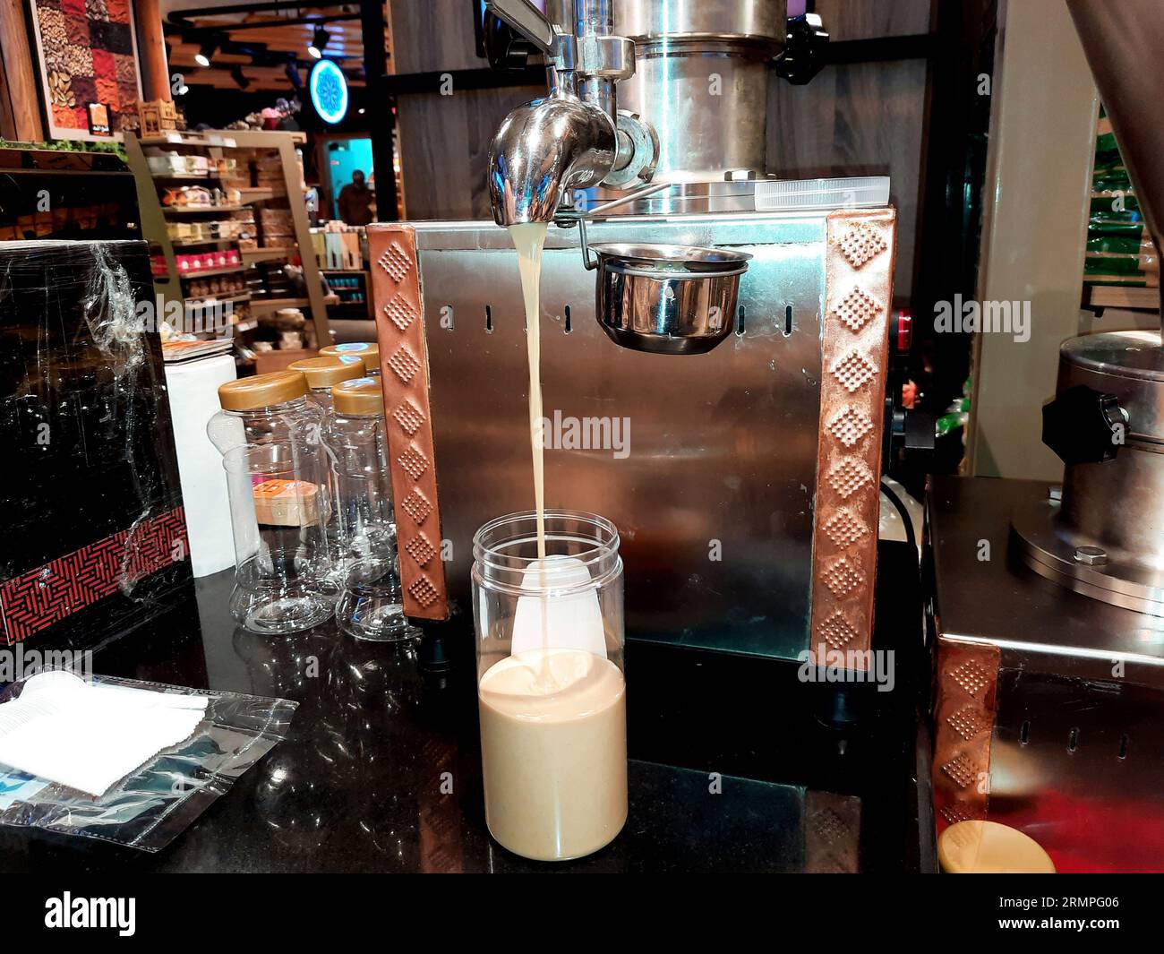 Cairo, Egypt, June 6 2023: Tahini sesame grinding machine, Tahini ...