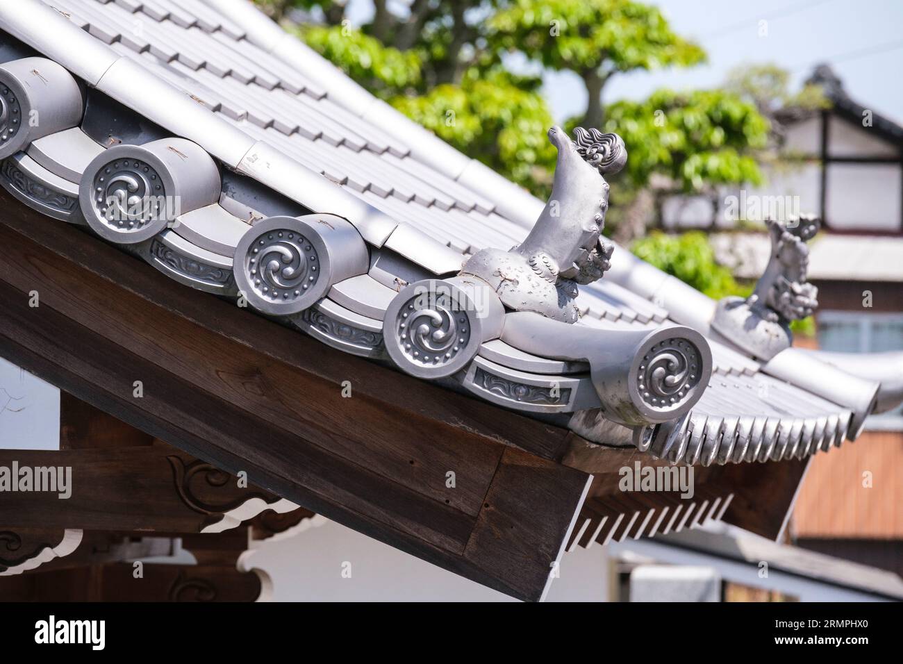 Japan, Kyushu. Kitsuki. Roof Fish Decoration. Because fish live in ...