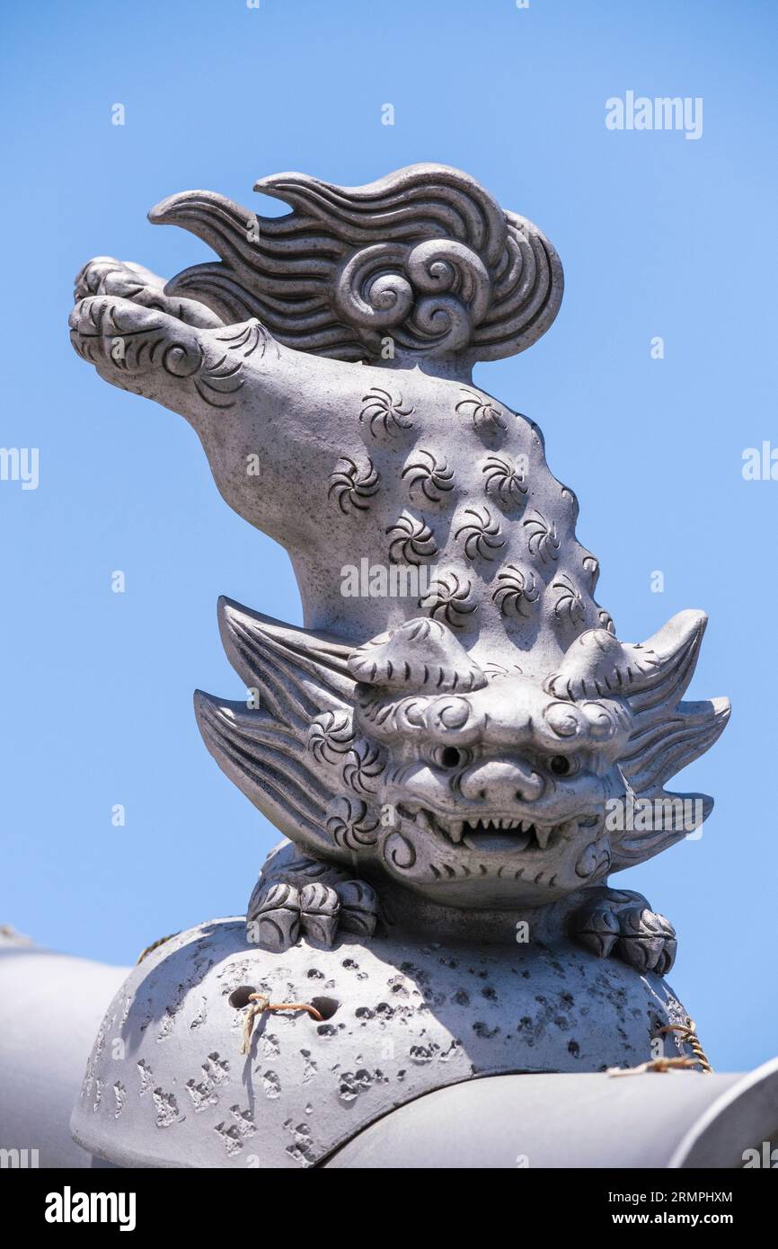 Japan, Kyushu. Kitsuki. Roof Fish Decoration. Because fish live in ...