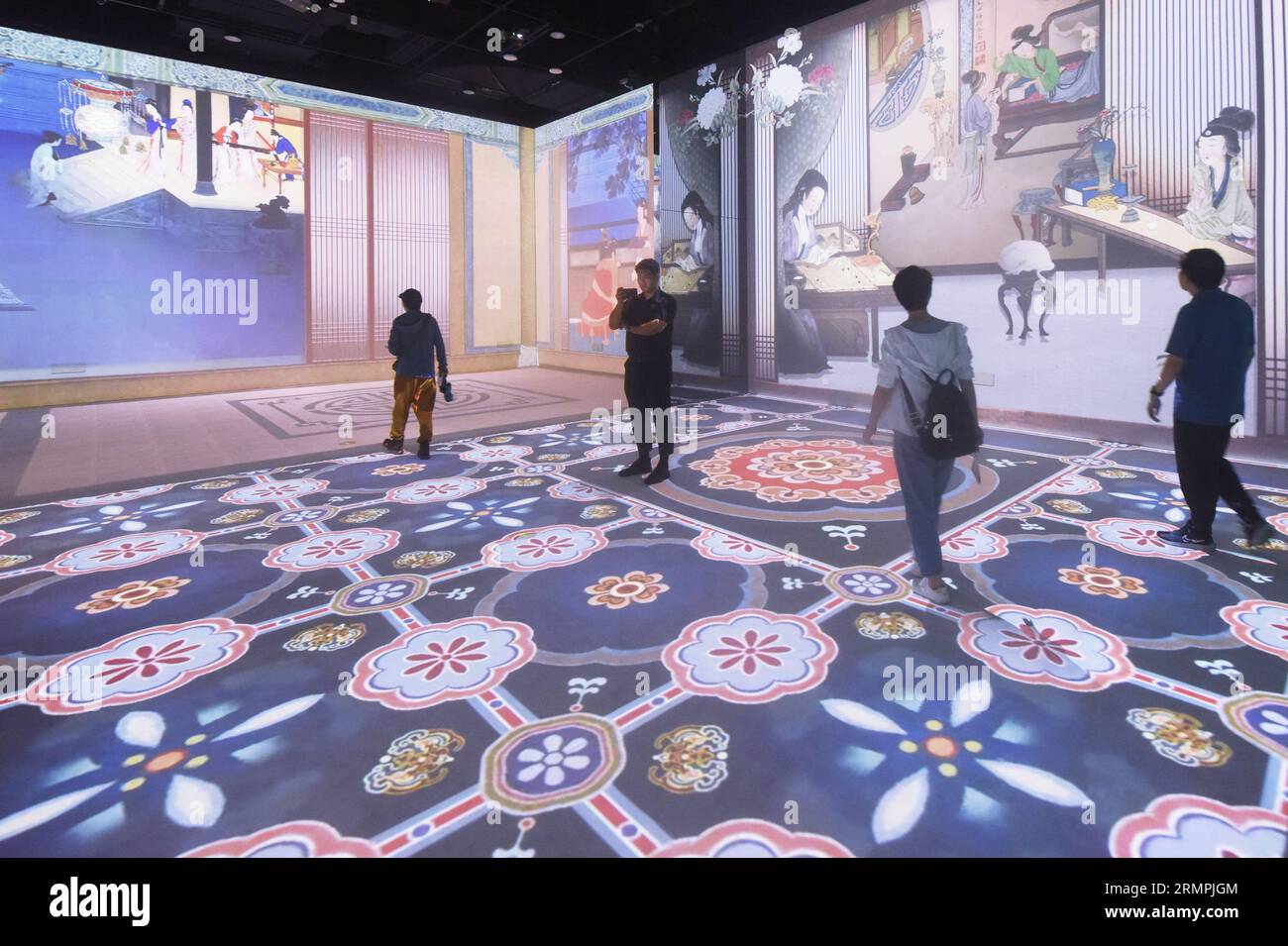 HANGZHOU, CHINA - AUGUST 29, 2023 - Visitors enjoy an immersive look at ...