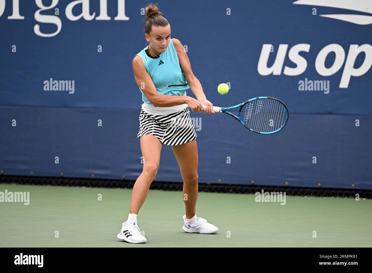 Clara Burel in action during a women's singles match at the 2023 US ...