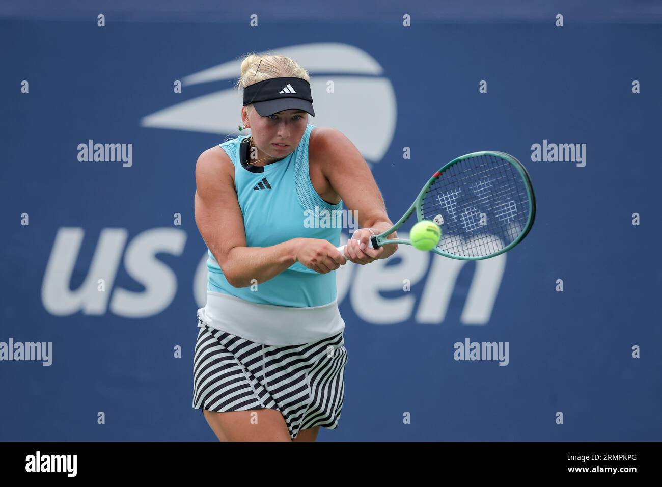 Clara Tauson in action during a women's singles match at the 2023 US ...