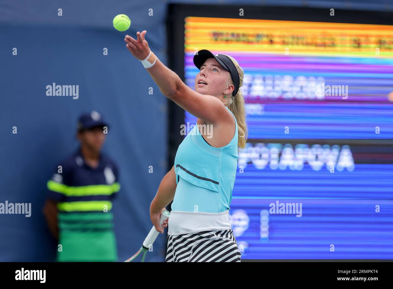 Clara Tauson in action during a women's singles match at the 2023 US ...