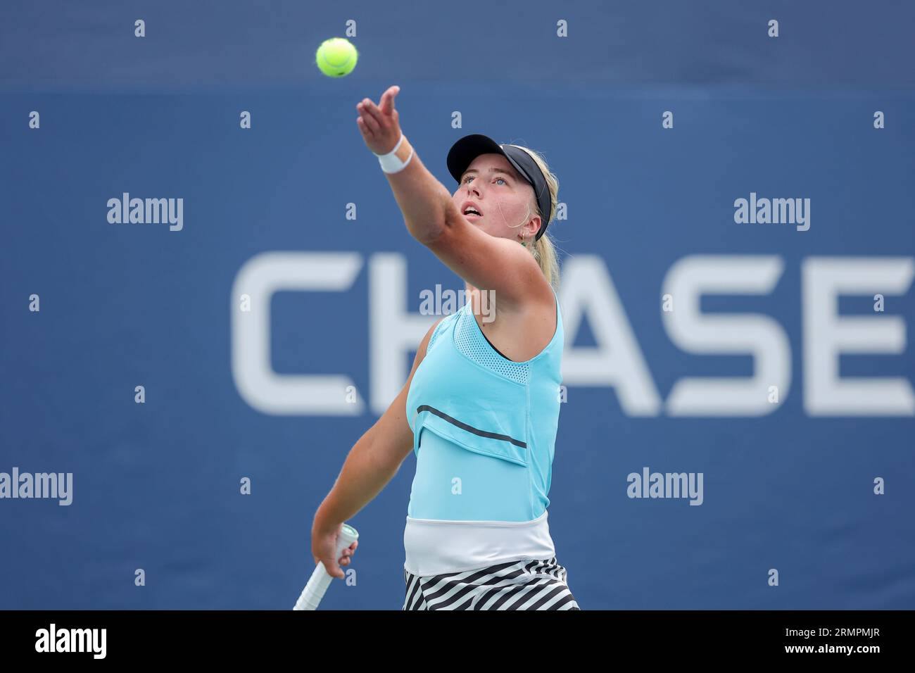 Clara Tauson in action during a women's singles match at the 2023 US ...
