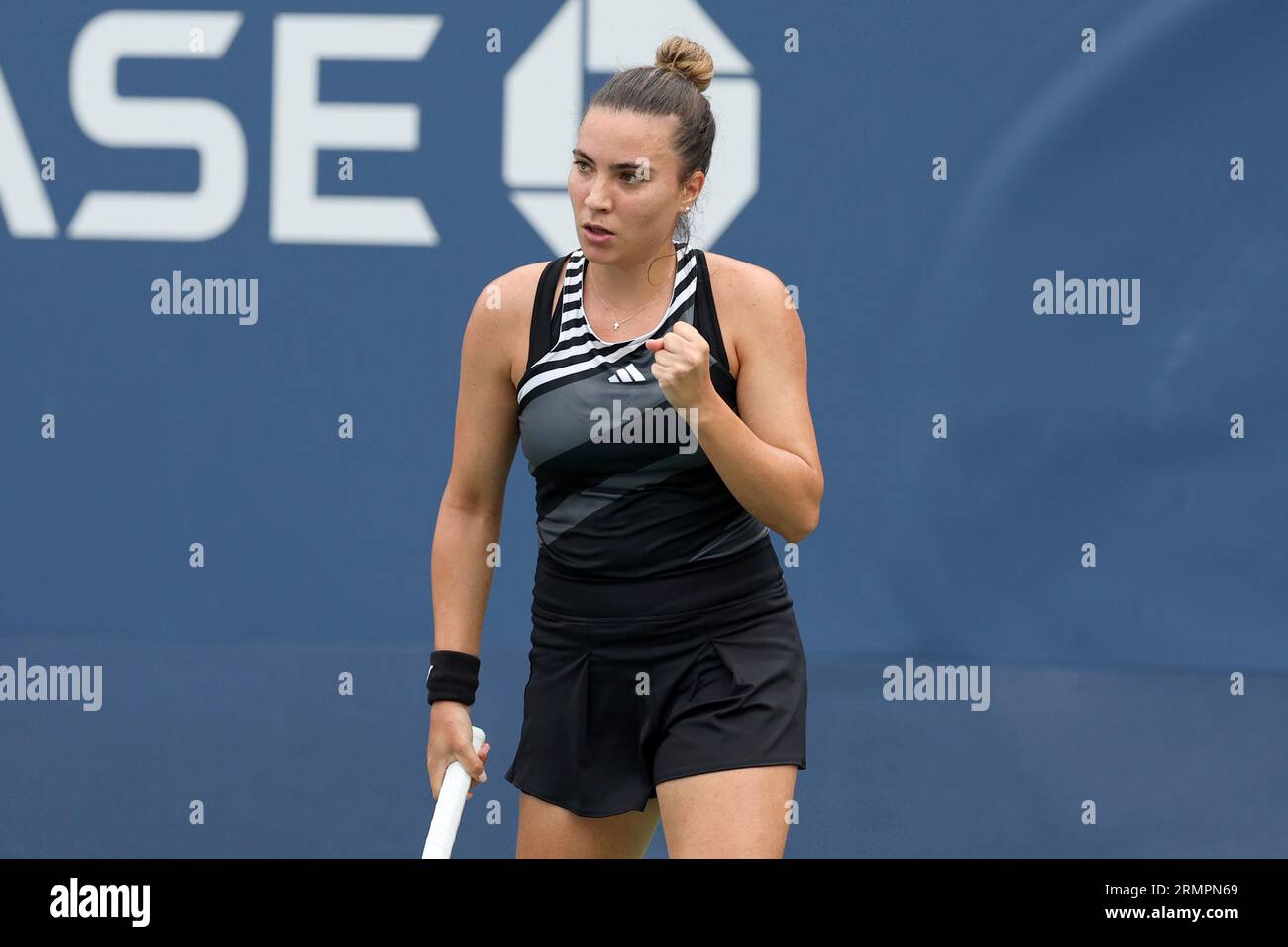 Elena-Gabriela Ruse reacts during a women's singles match at the 2023 ...