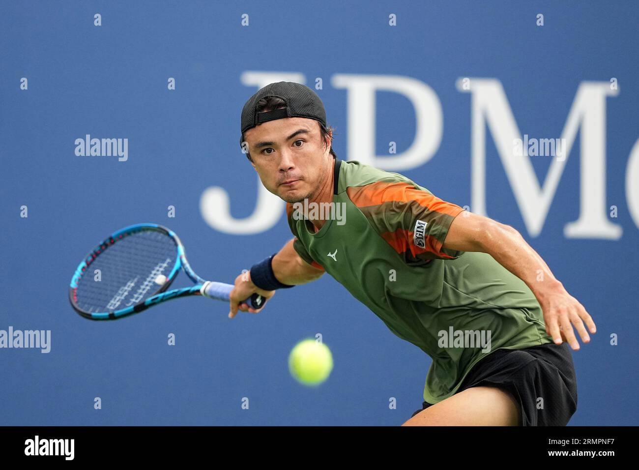 Taro Daniel in action during a men's singles match at the 2023 US Open ...