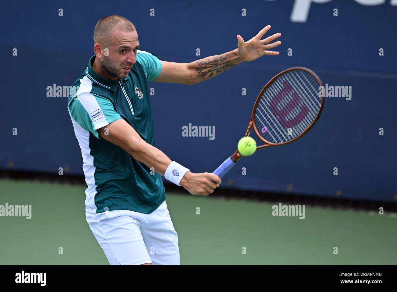 Daniel Evans in action during a men's singles match at the 2023 US Open ...