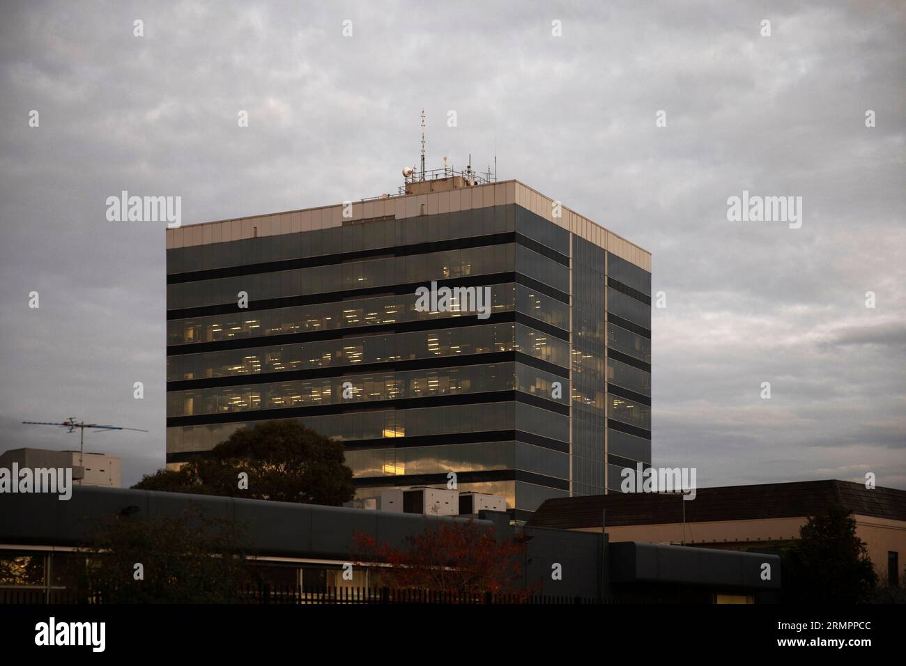 Dark building creating a striking contrast within the urban landscape ...