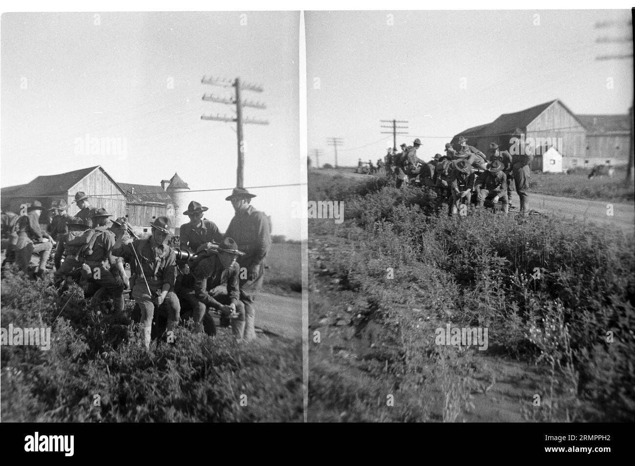 Soldiers sitting near road. Members of the United States Army’s 114th ...