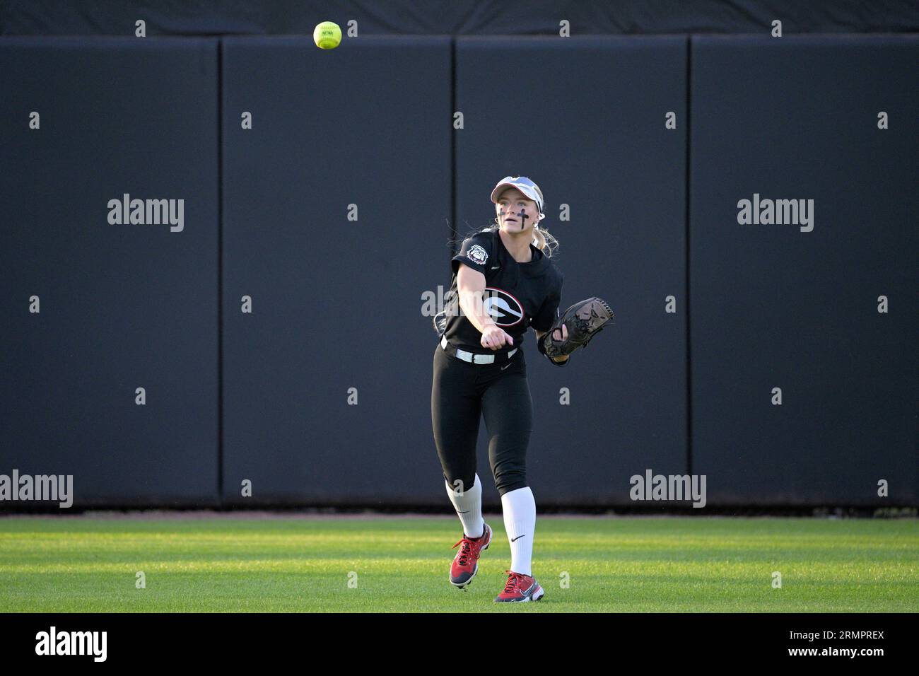Georgia's Dallis Goodnight warms up before an NCAA college softball ...