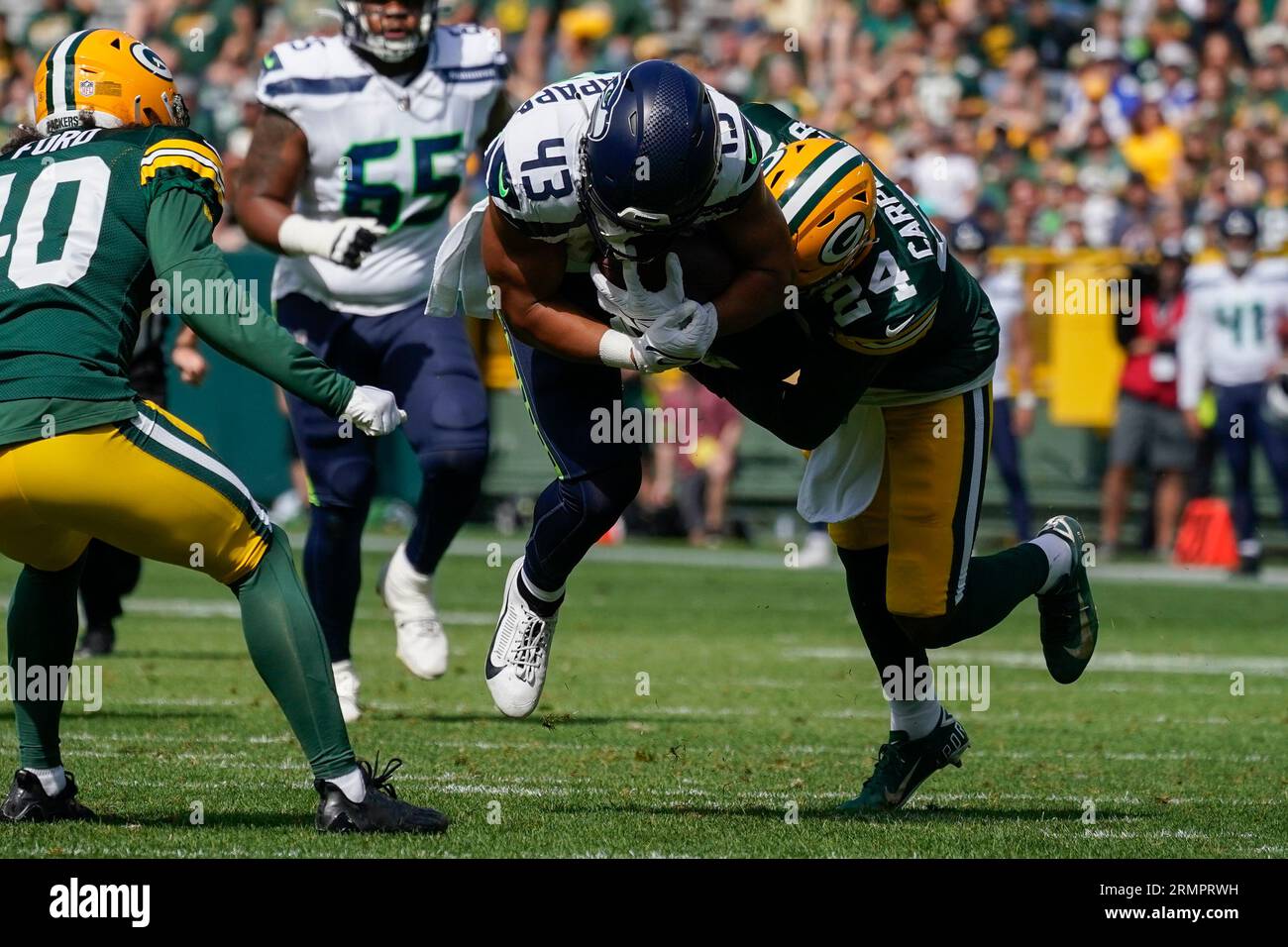 Seattle Seahawks running back Wayne Taulapapa (43) is tackled by Green ...