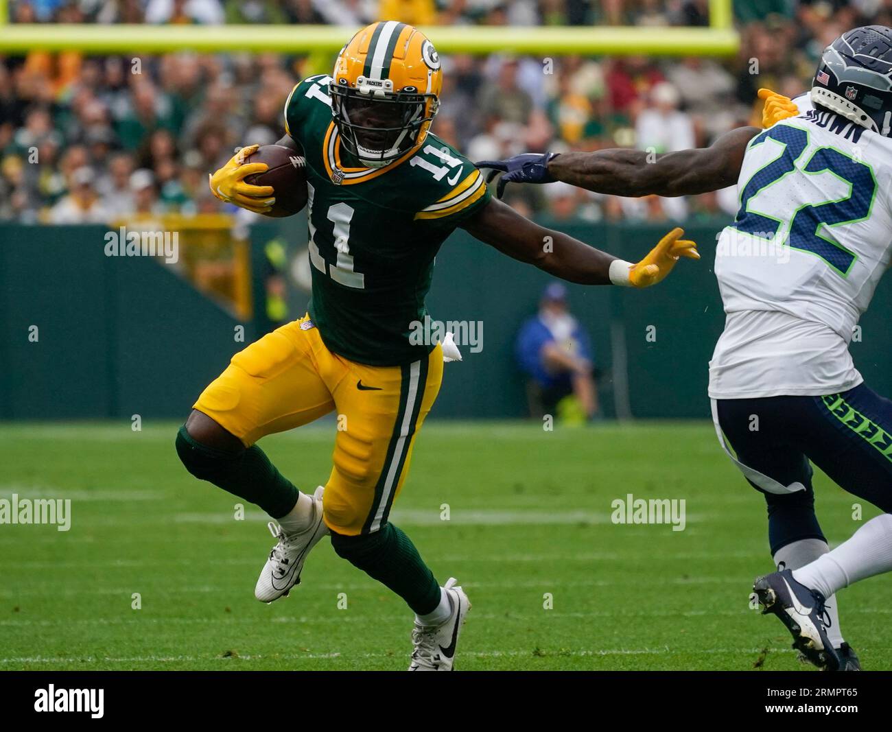 Green Bay Packers wide receiver Jayden Reed (11) runs after making a ...