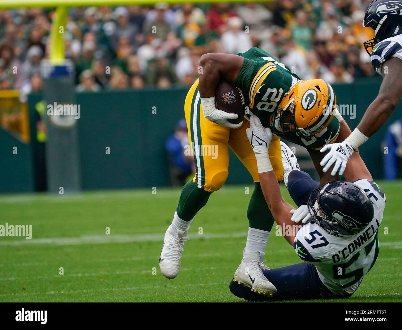 Seattle Seahawks linebacker Patrick O'Connell (57) tackles Green Bay ...