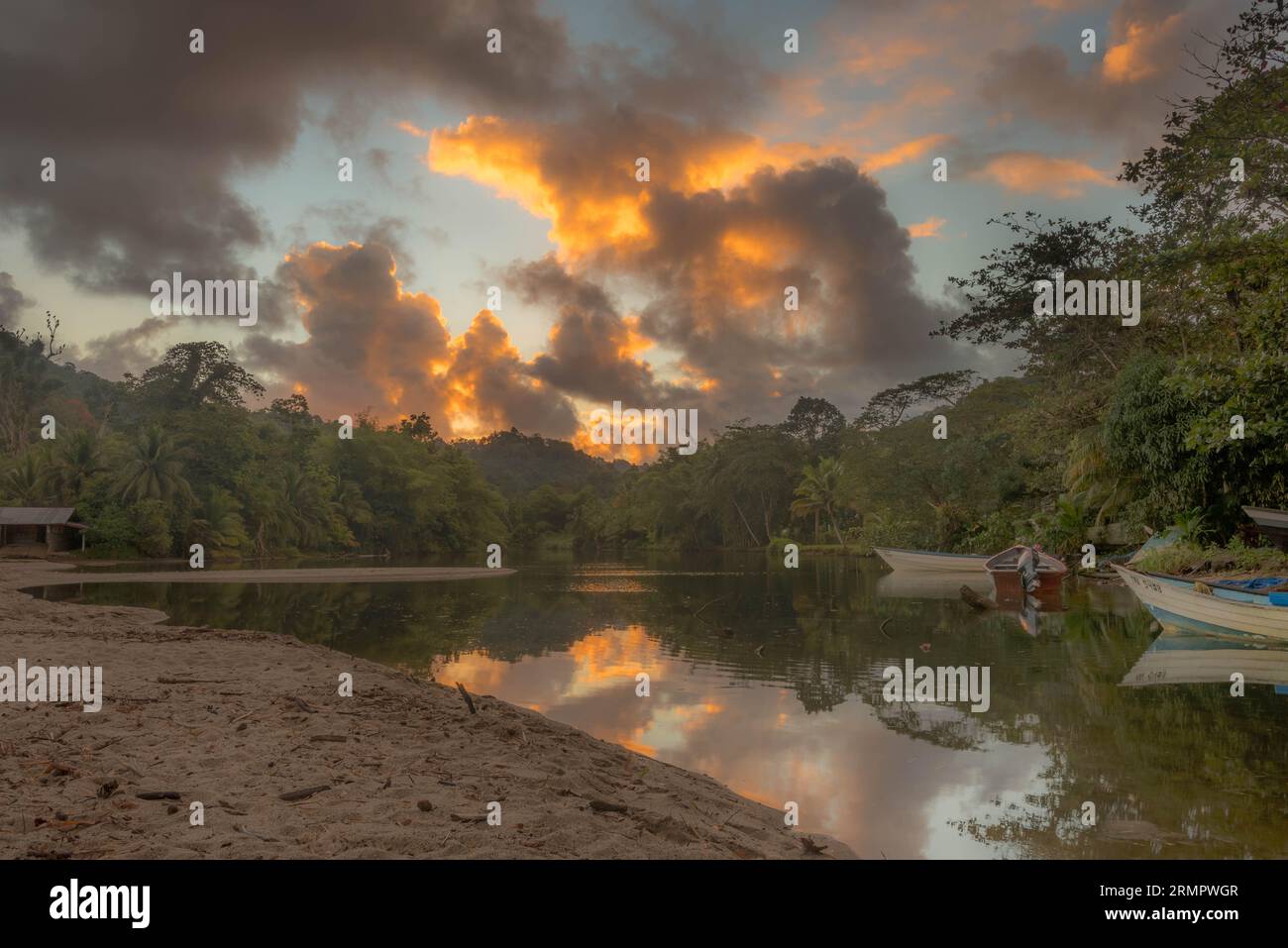 Sunrise at the river mouth of Grande Riviere Stock Photo - Alamy