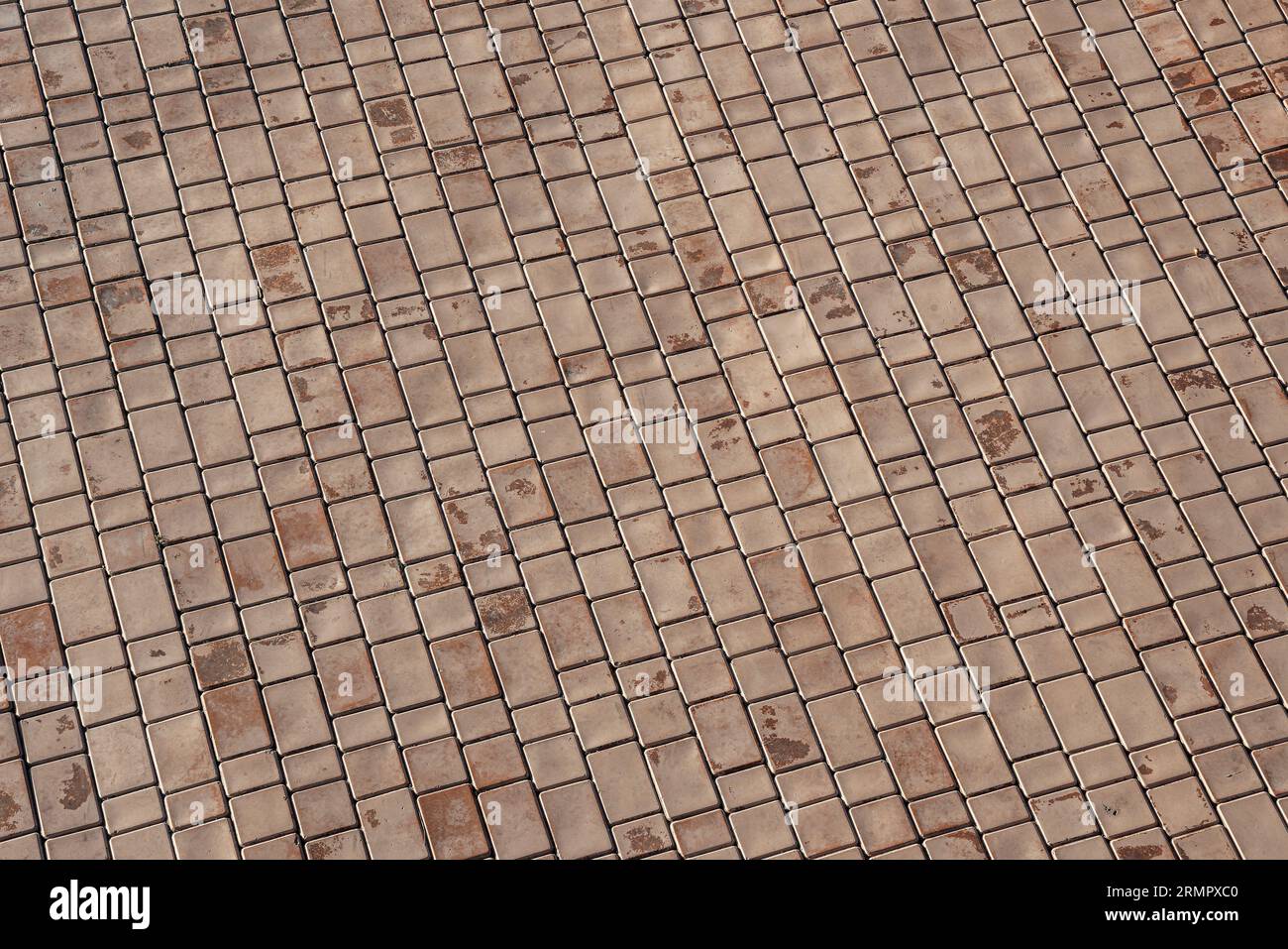 The texture of a red tiled pavement with perspective. Abstract ...